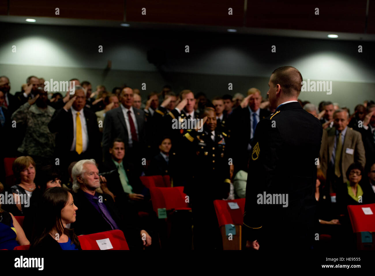 Medal of Honor recipient Staff Sgt. Ryan Pitts is saluted by current ...