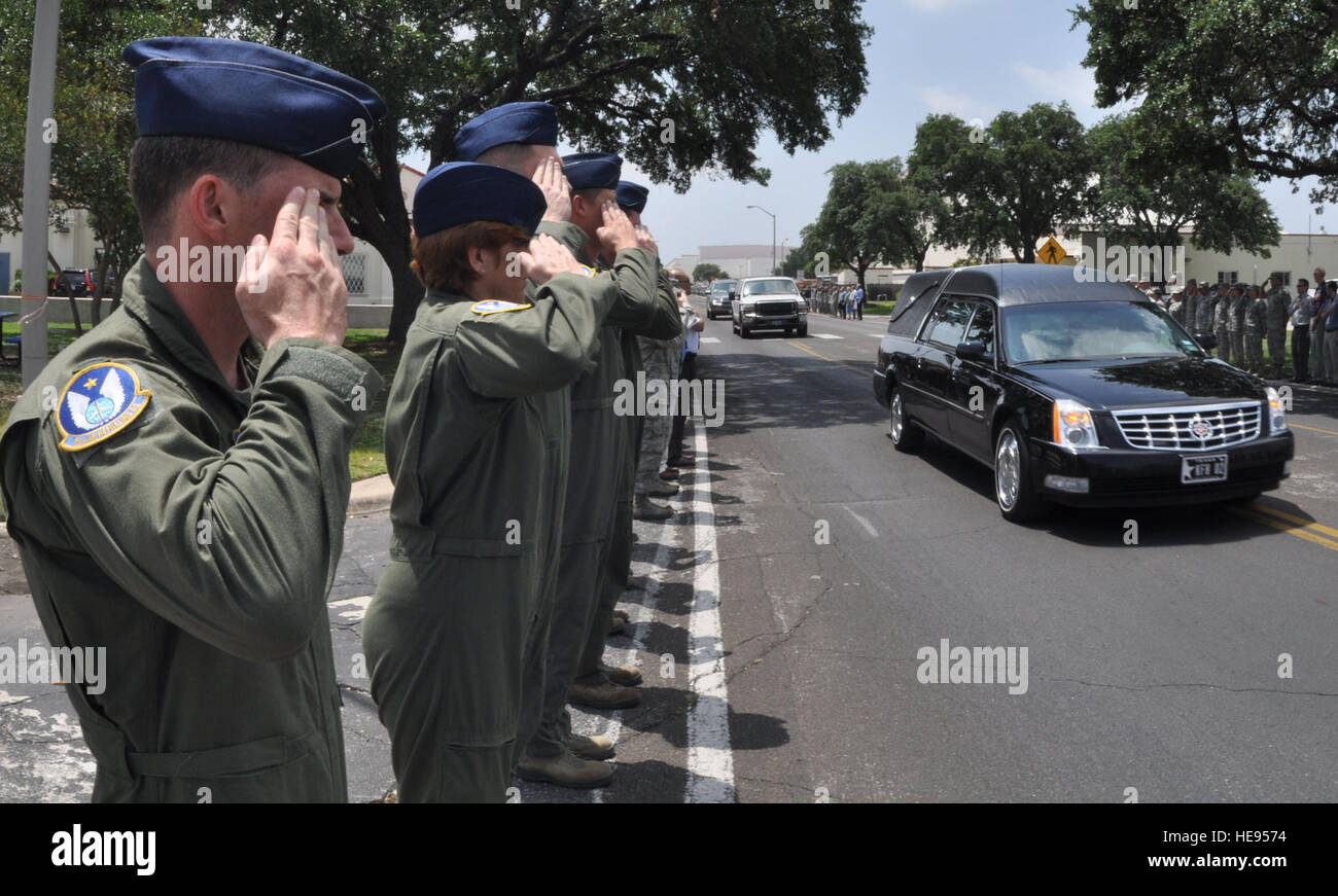 As the vehicle carrying Capt. Mark Voss passes, pilots and boom ...