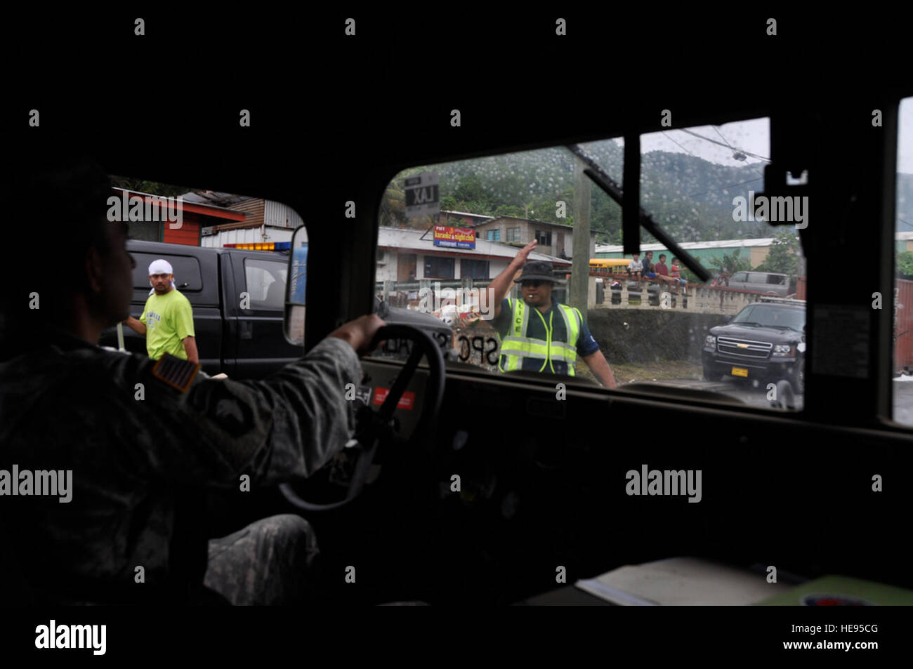 PAGO PAGO - A American Samoan traffic policeman directs traffic through ...