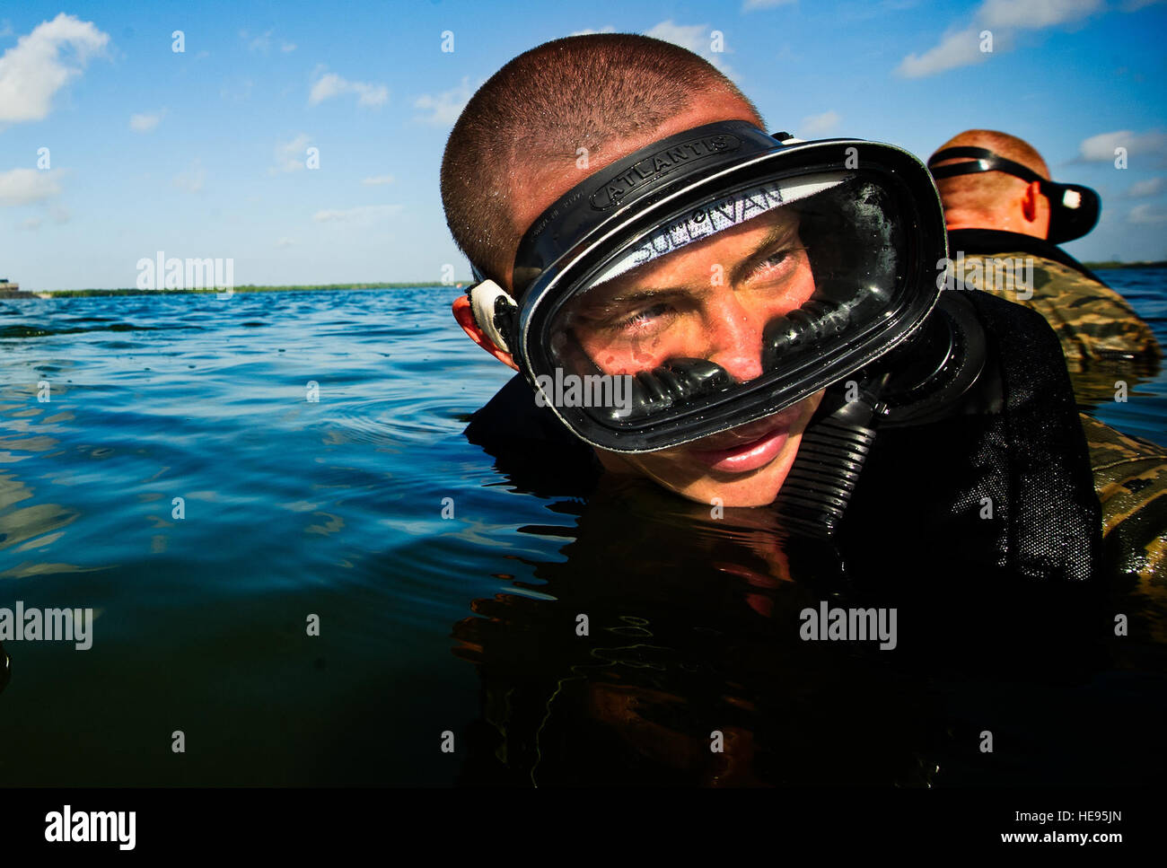 A U.S. Air Force pararescue trainee participates in a swimming exercise ...