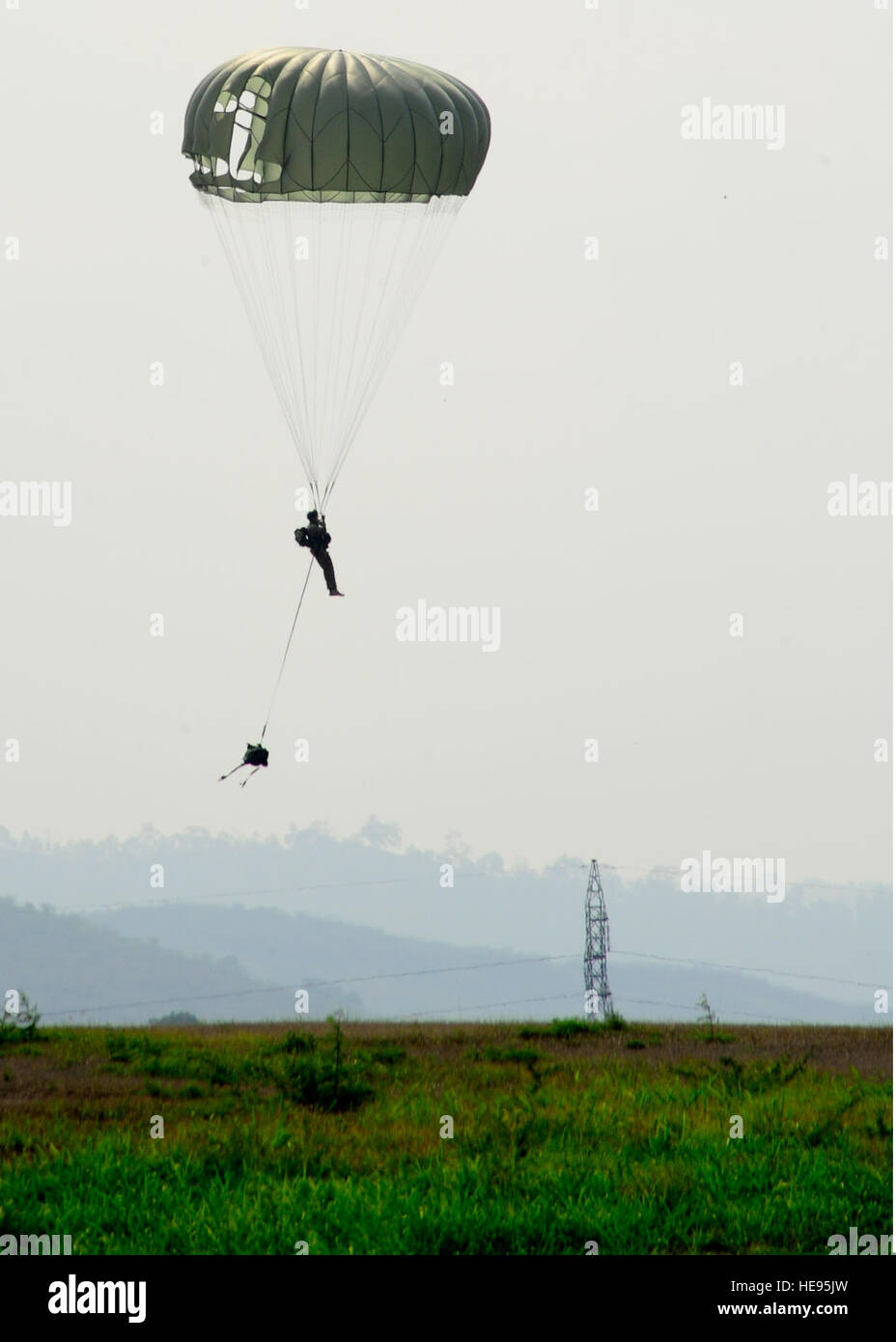 A U.S. Army paratrooper performs a successful static line proficiency ...