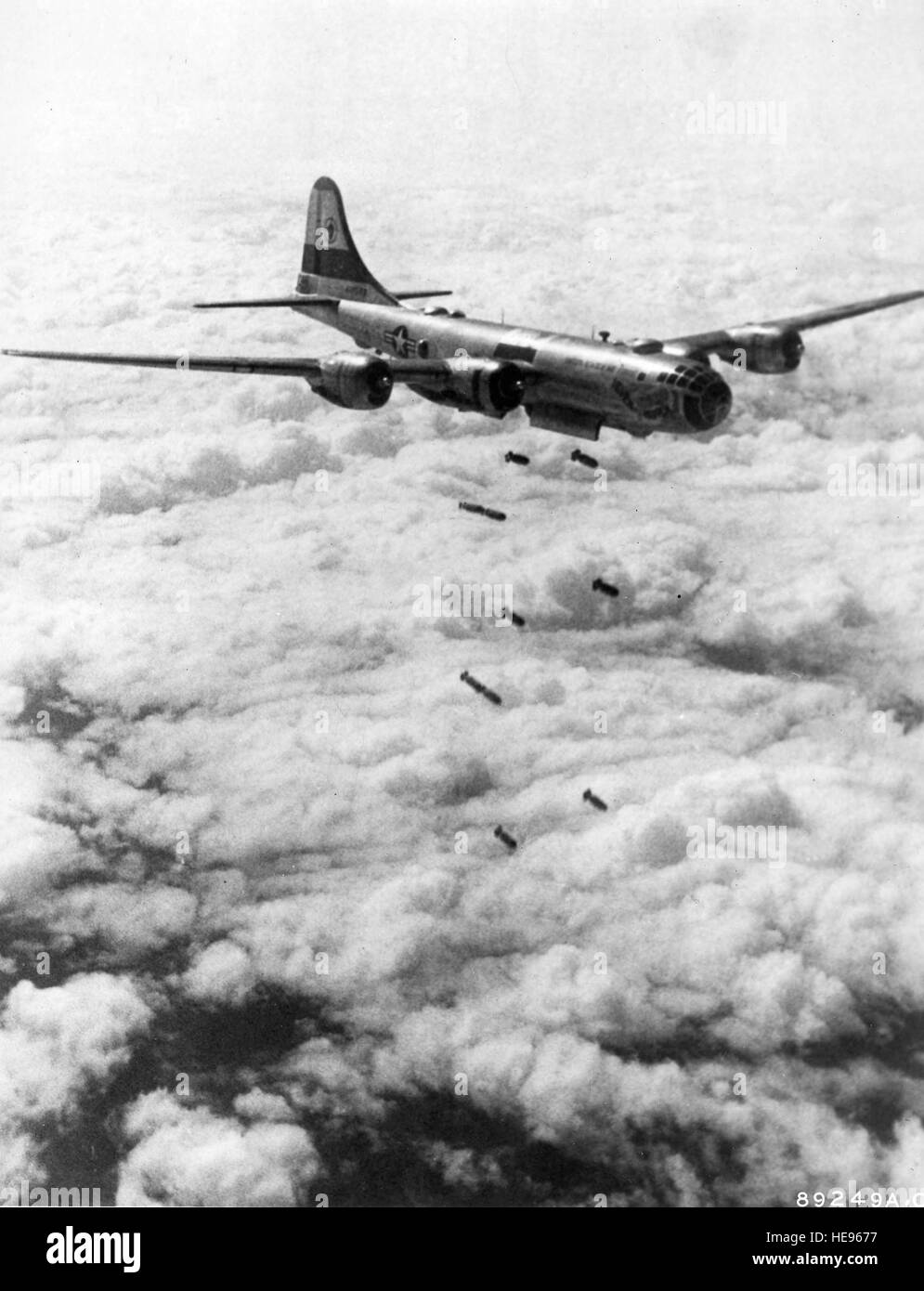 A B-29 Superfortress of the 19th Bomb Group conducts a bombing mission ...