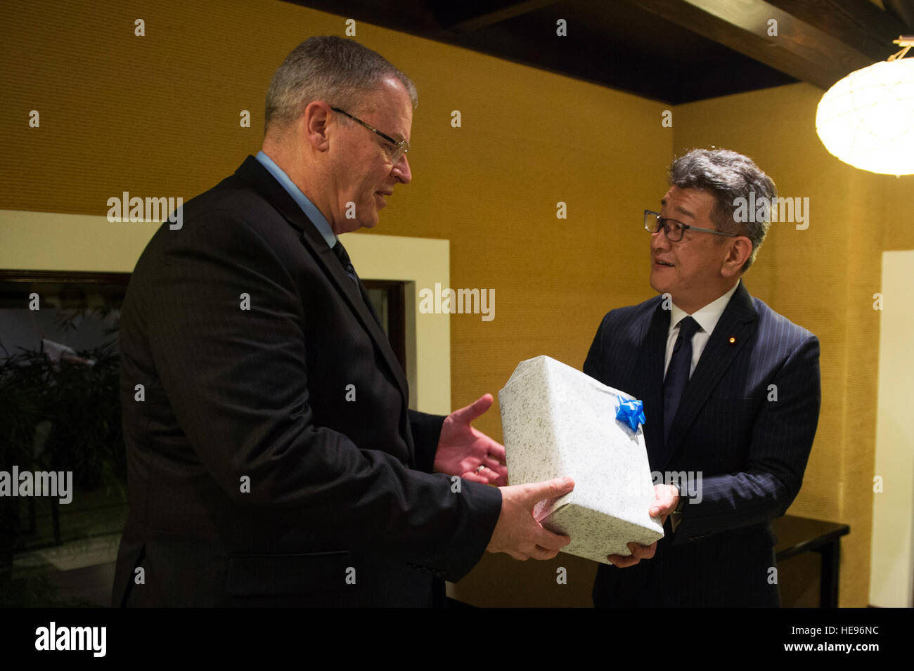 Japanese Parliamentary Senior Vice Minister of Defense Ryota Takeda presents Deputy Secretary of ...