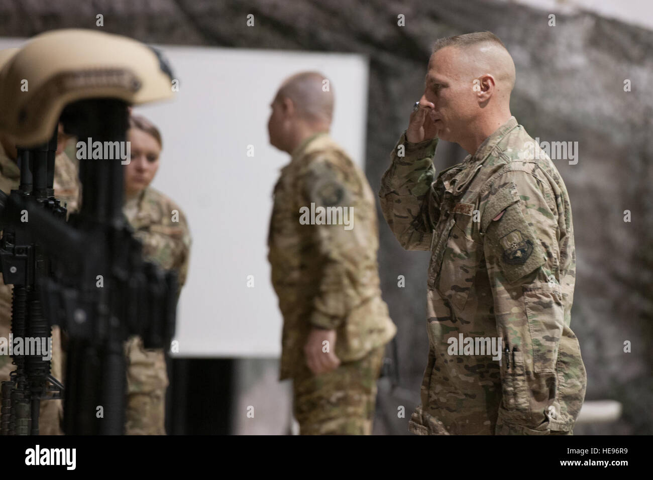 Chief Master Sgt. Matt Grengs, 455th Air Expeditionary Wing command chief, pays his respects ...