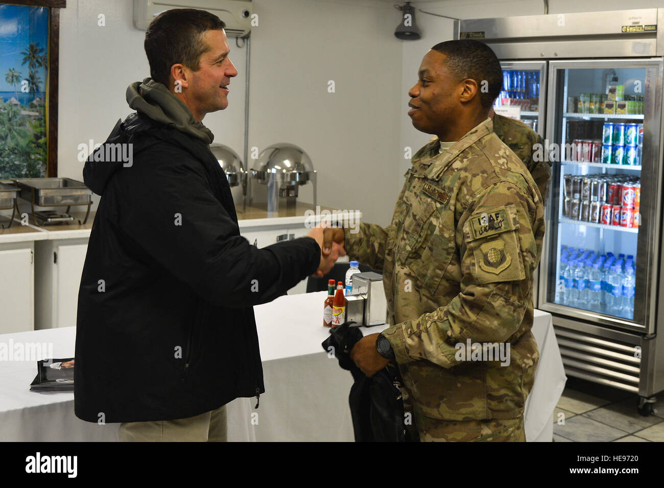 Baltimore Ravens head coach John Harbaugh shakes hands with U.S. Air ...