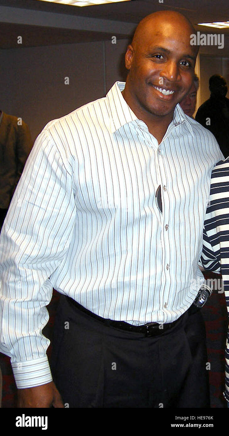 San Francisco Giants left fielder Barry Bonds poses with Airman 1st ...