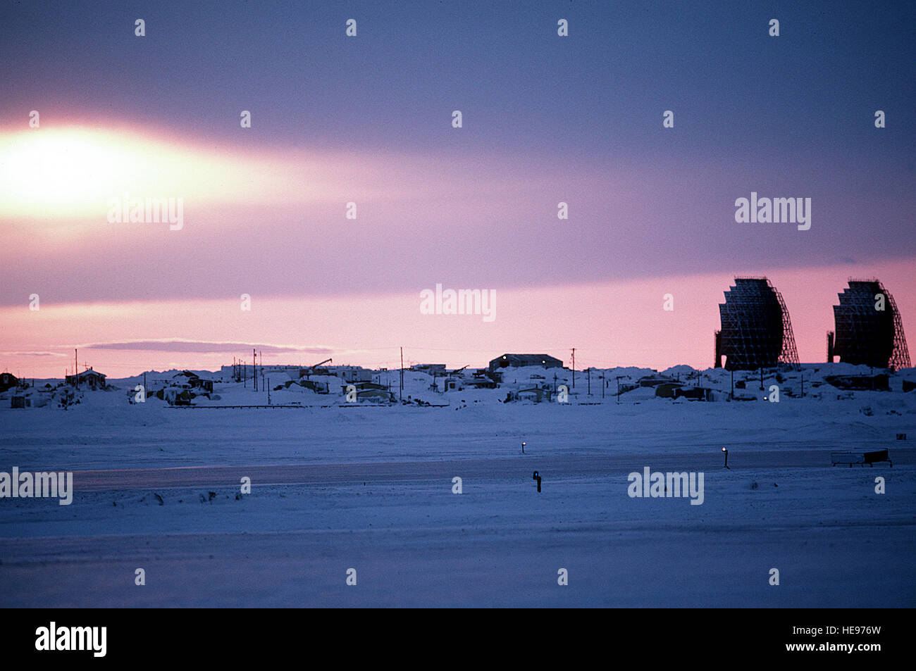 The sun sets behind a radar station. The station is one of 30 under U.S ...