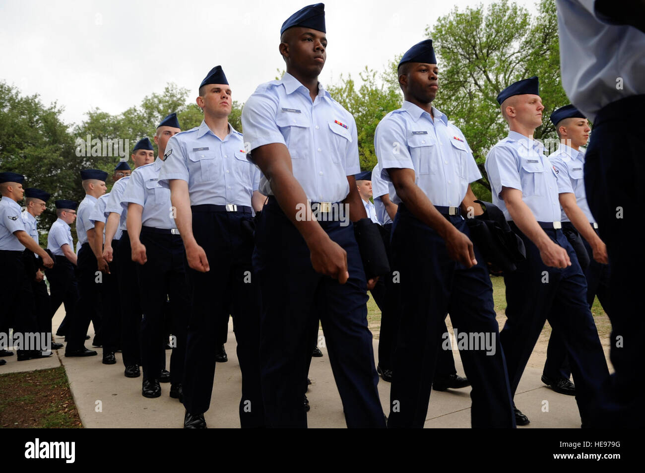 Basic trainees march to the parade grounds Apr. 24 for their graduation ...