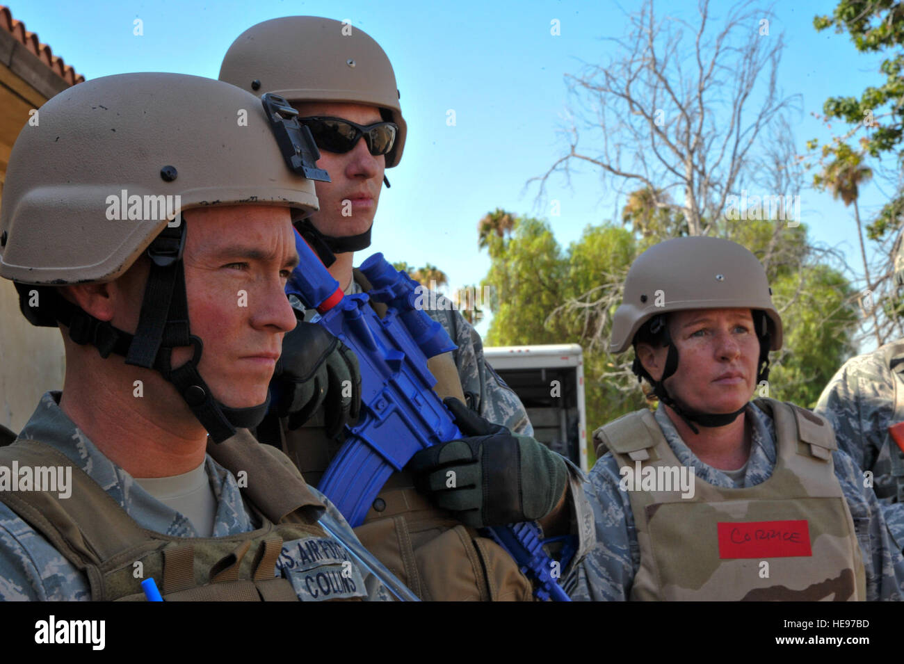 U.S. Air Force Staff Sgt. Jeff Collins (left), Staff Sgt. Kyle Brasier ...