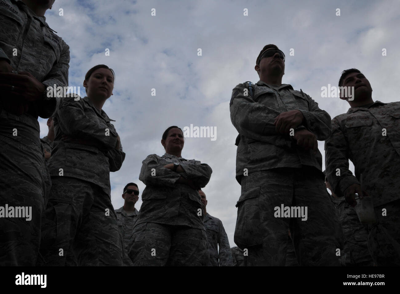 U.S. airmen, sailors and Marines receive mission information during ...