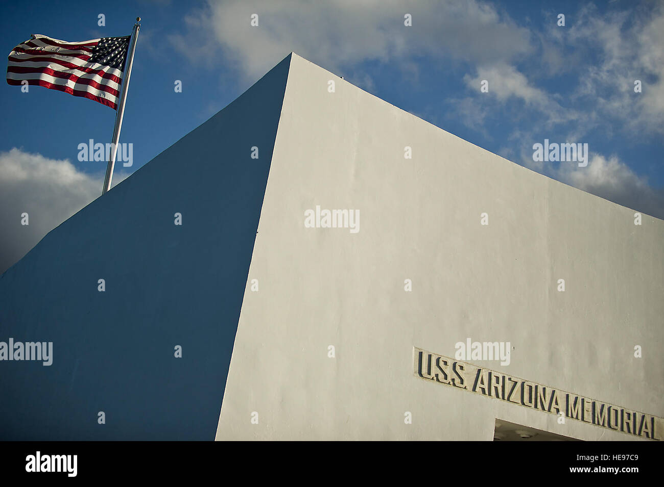 An American Flag flies over the USS Arizona Memorial June 4, 2012 ...