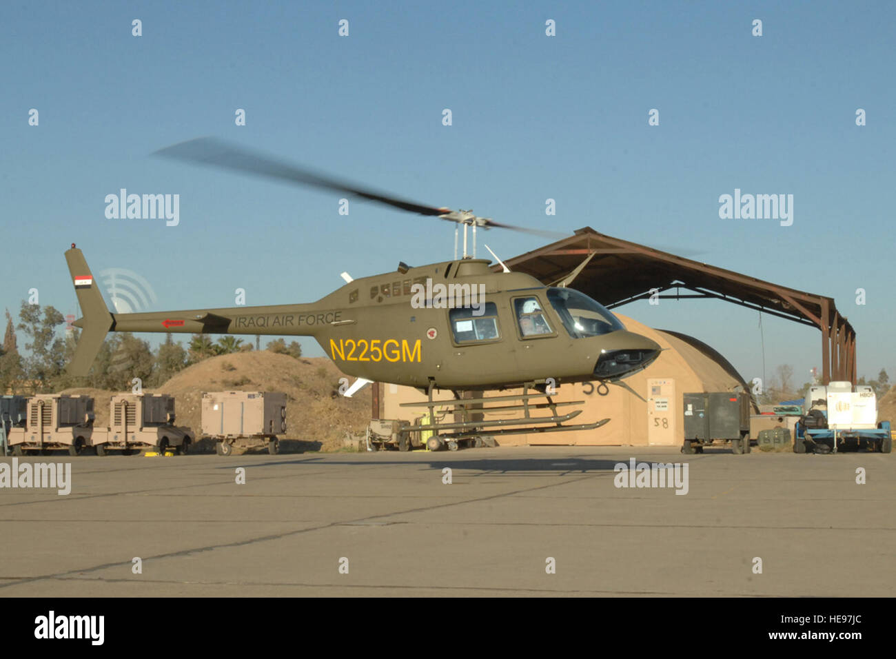 A Bell Jet Ranger 206B helicopter begins to hover as test pilots put it ...