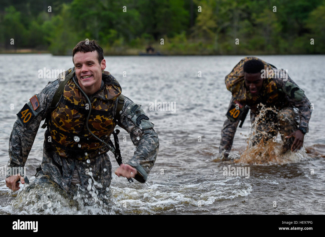 U.S. Army Staff Sgt. John Berda (left) and Sgt. Sheldon Evans (right ...