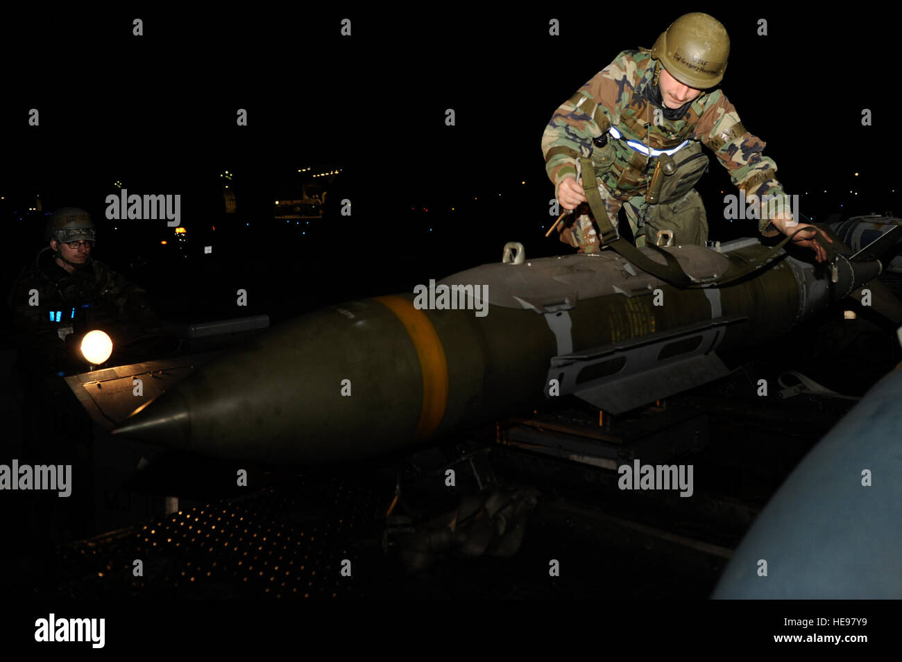 U.S. Air Force Staff Sgt. Gregory Harrison, right, with the 8th ...