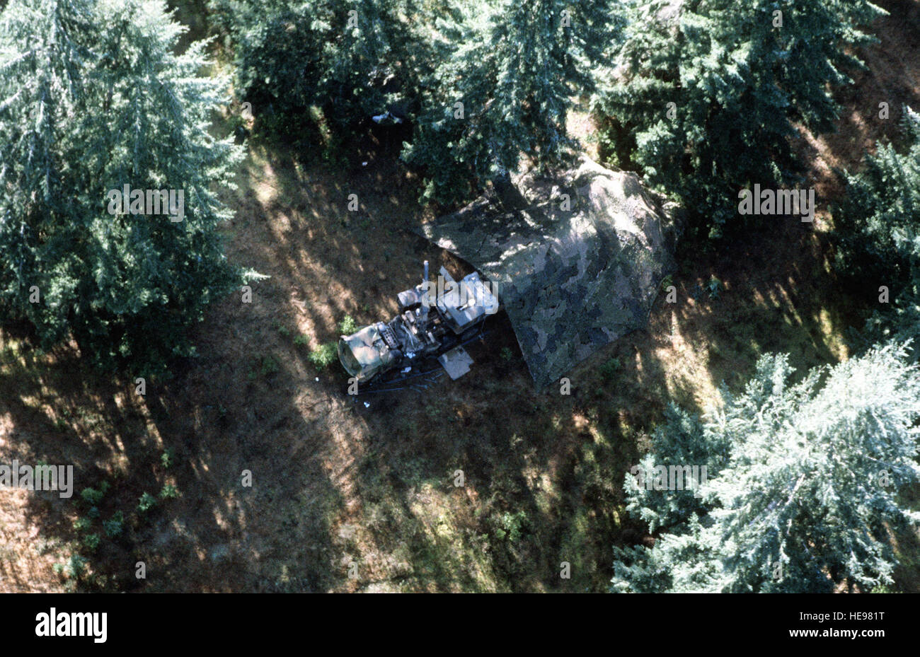 Aerial view of a transporter-erector-launcher (TEL) vehicle covered ...