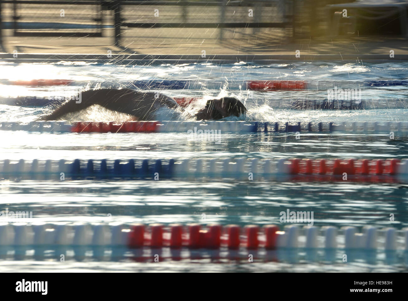 Participants swim for a biathlon July 17, 2015 at Scott Air Force Base ...