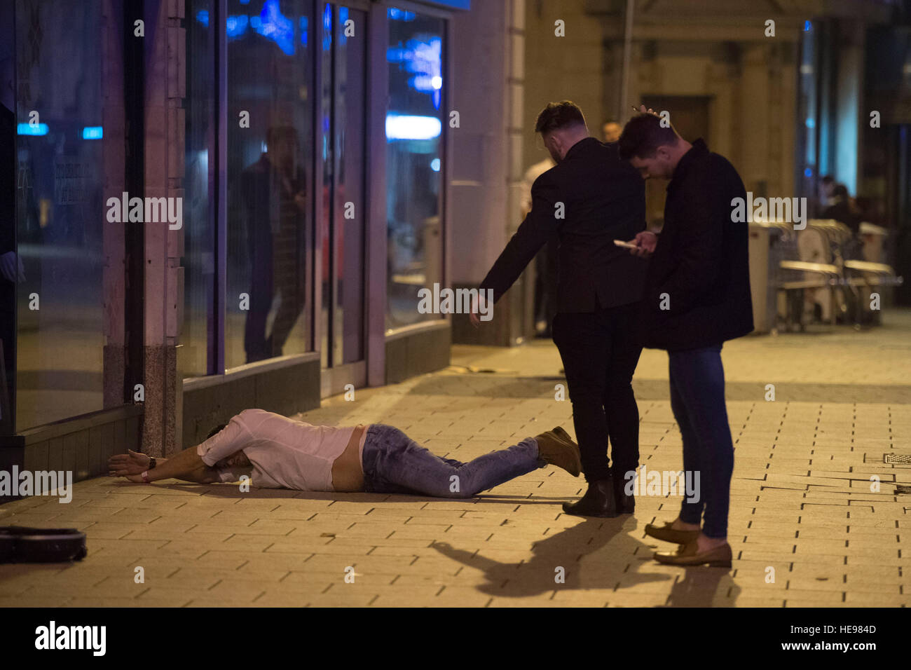Drunk men on street hi-res stock photography and images - Alamy