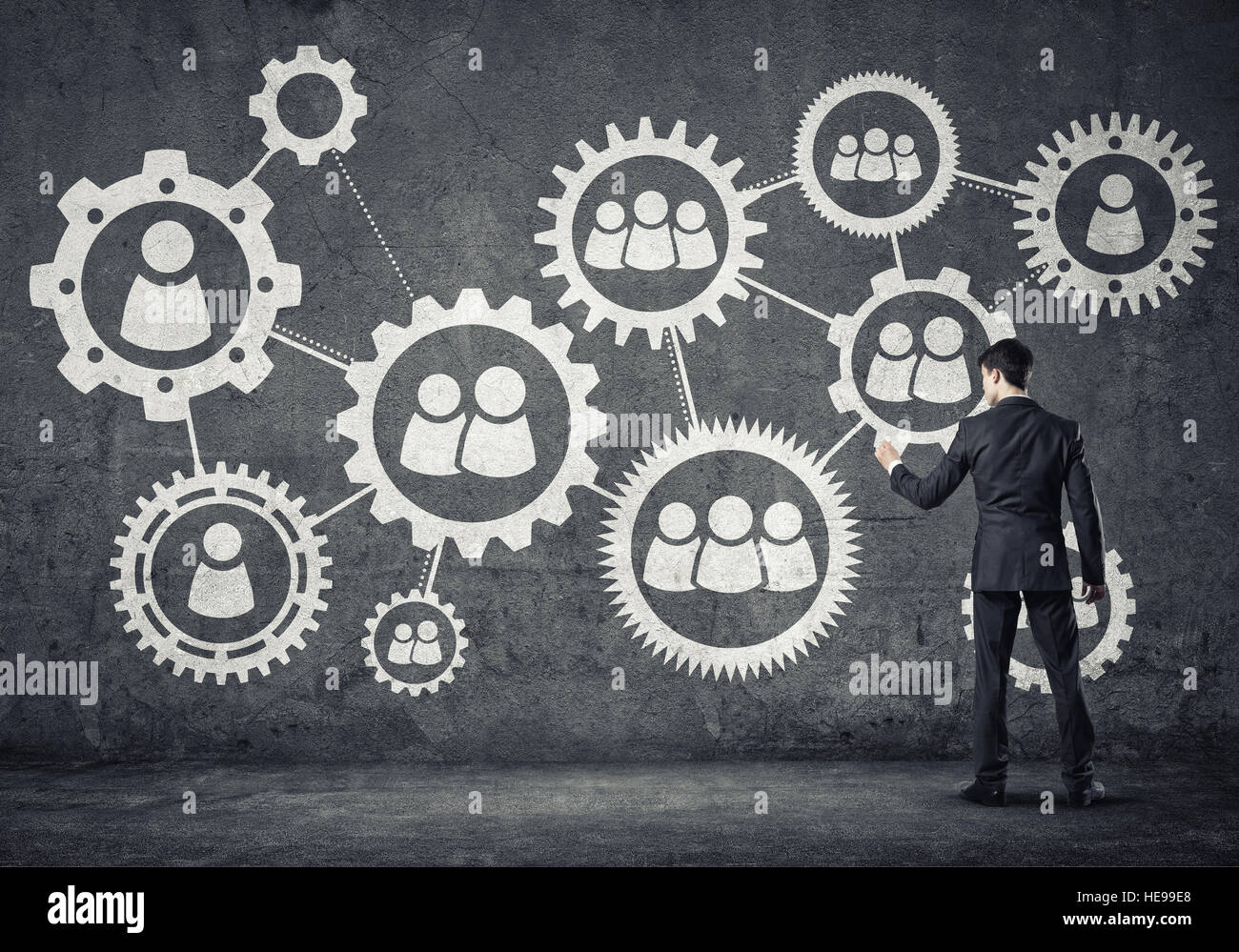 Businessman standing with back and drawing concept of teamwork and ...