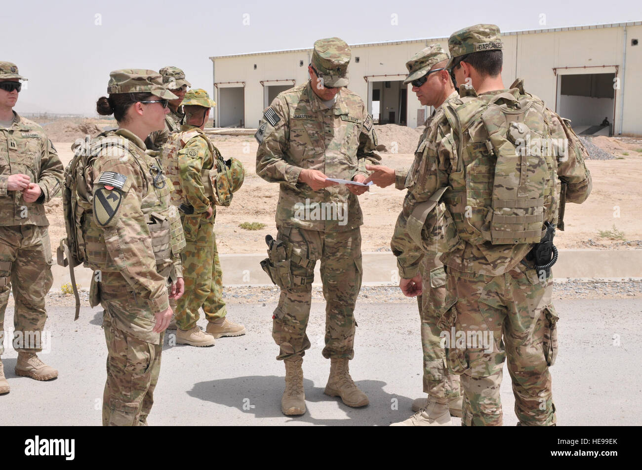 U.S. Army Brig. Gen. Clark LeMasters, Jr., center, NATO Training ...