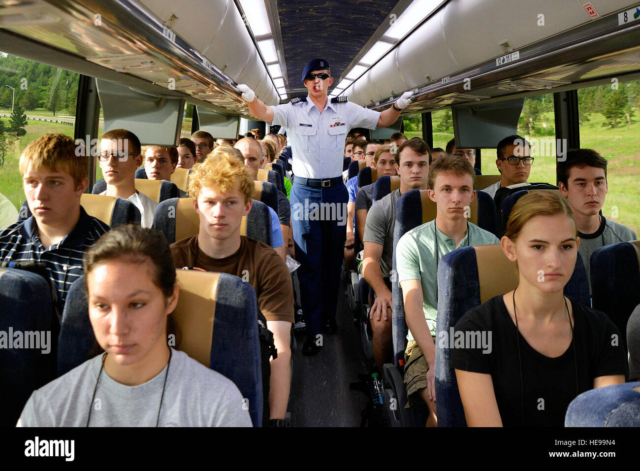 A basic cadet training cadre member provides direction to basic cadets ...