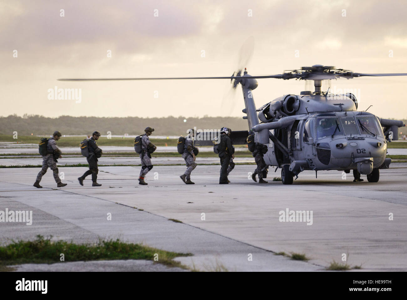 Members of the 736th Security Forces Squadron board an MH-60 Sierra ...