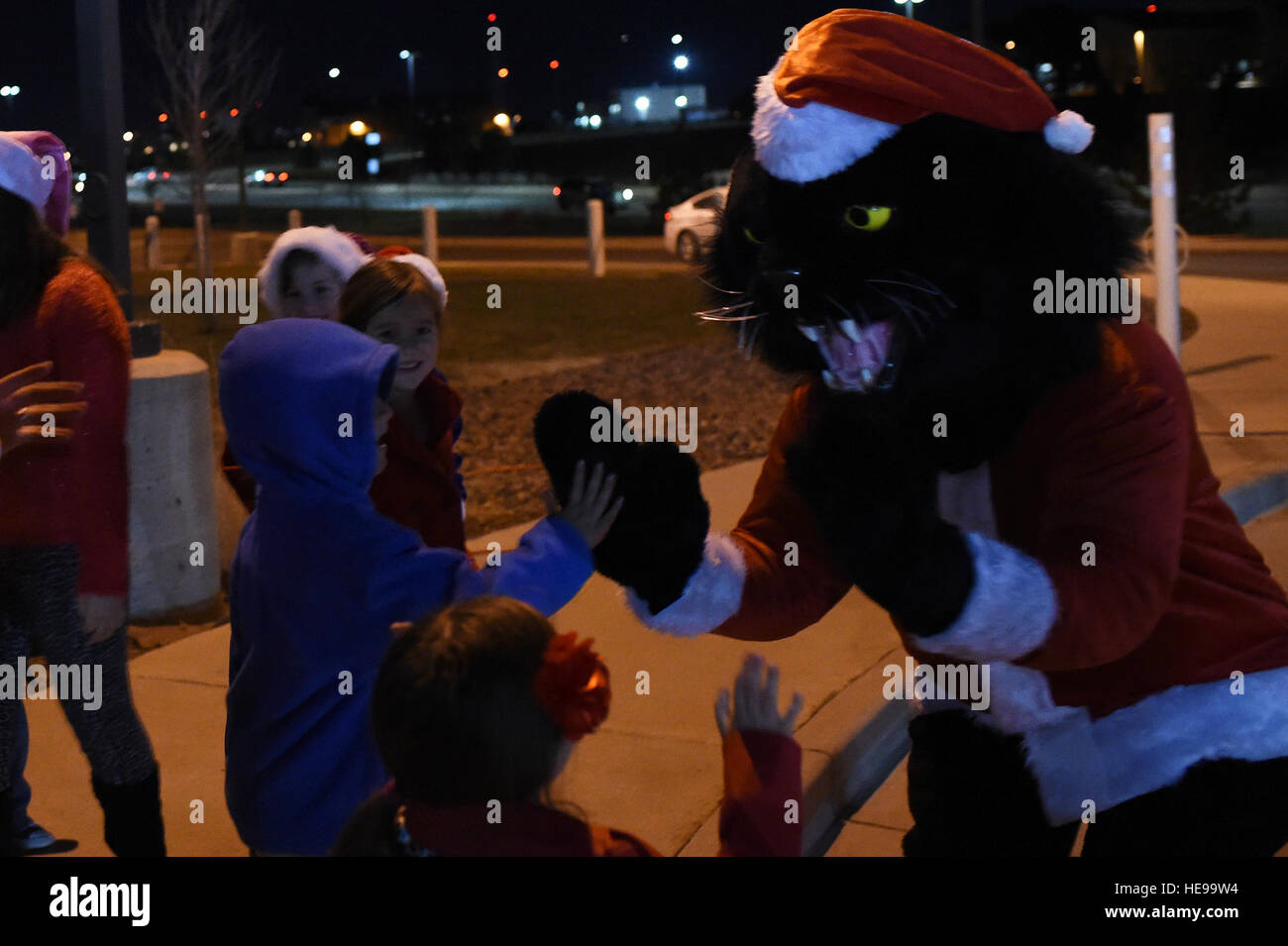 Team Buckley children high-five the 460th Space Wing mascot, Buck Lee ...