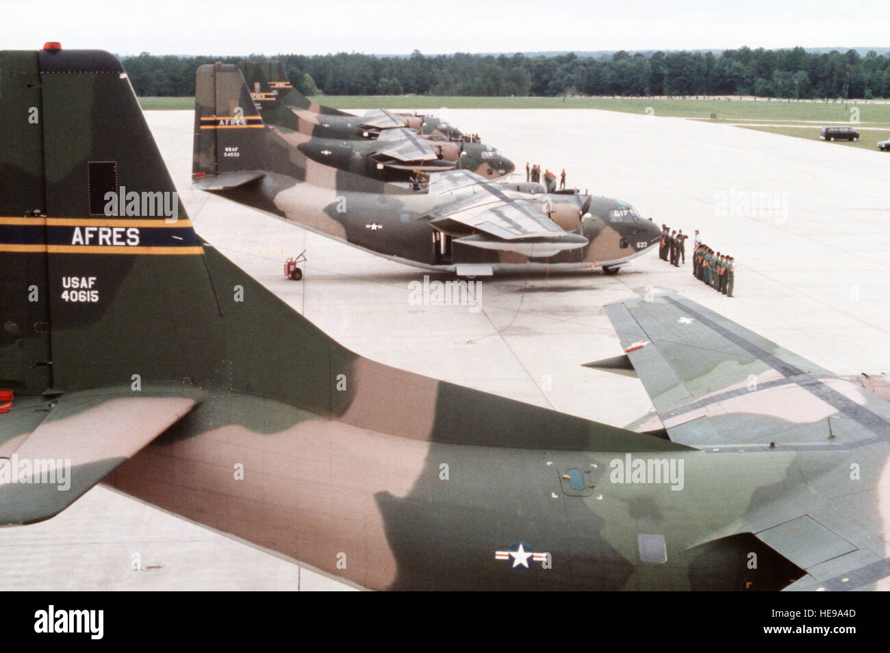 C-123 Provider crew members stand in front of their aircraft during ...
