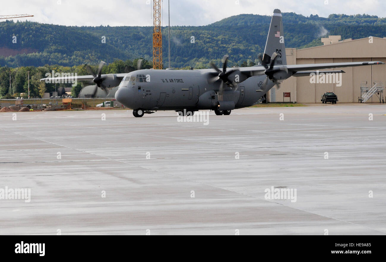 A newly arrived C-130J model that is replacing the C-130E model arrives ...