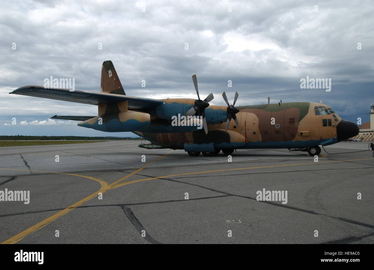 A Spanish air force C-130 Hercules aircraft parks on the flightline to ...