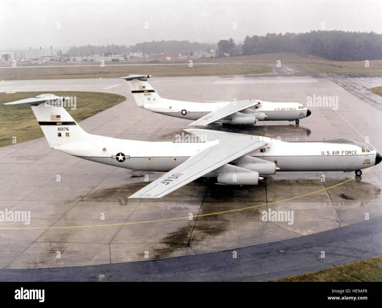 A right side view of a parked C-141A (background) and a C-141B ...