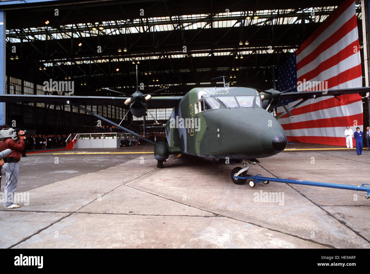 The first US Air Force C-23A Sherpa aircraft is rolled out of a hangar ...