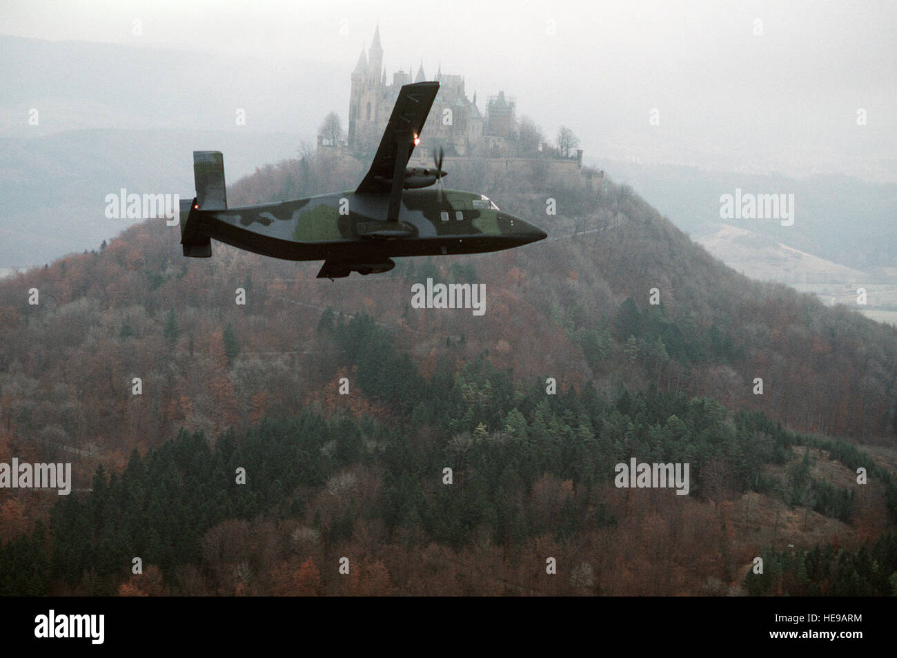 An air to air right side view of a 10th Military Airlift Squadron C-23A ...