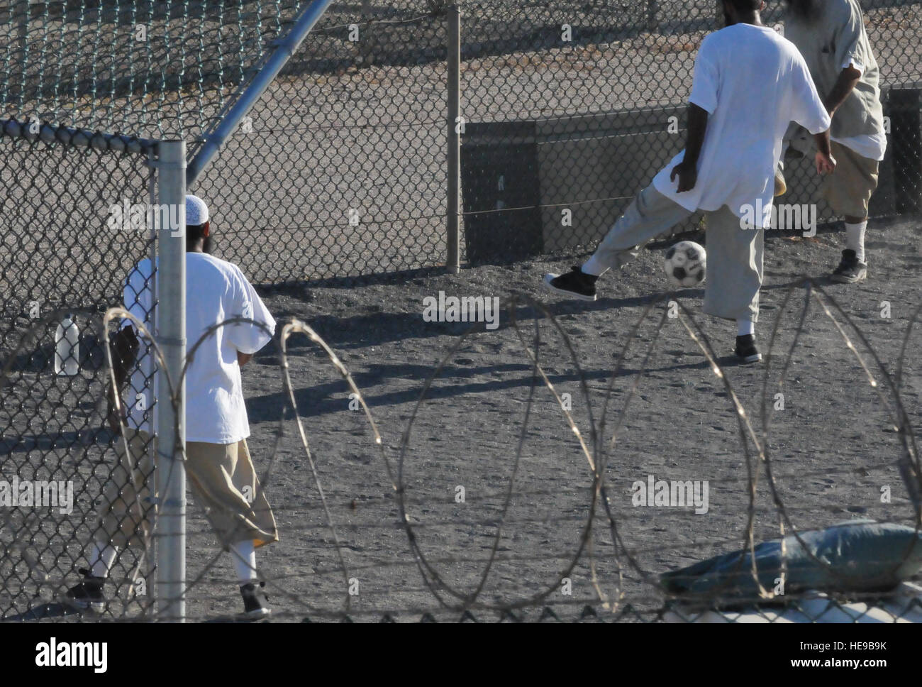 GUANTANAMO BAY, Cuba – Detainees play soccer in the recreation area of ...