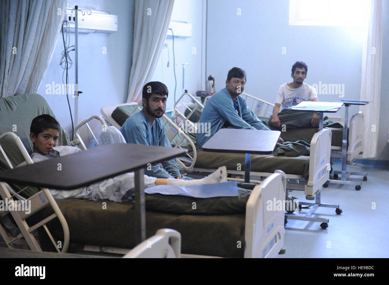 Patients await departure in the recovery ward at Camp Shaheen Regional ...