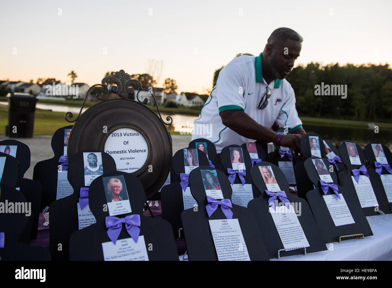 Memorial Photos Are Displayed On A Table Telling The Stories Of