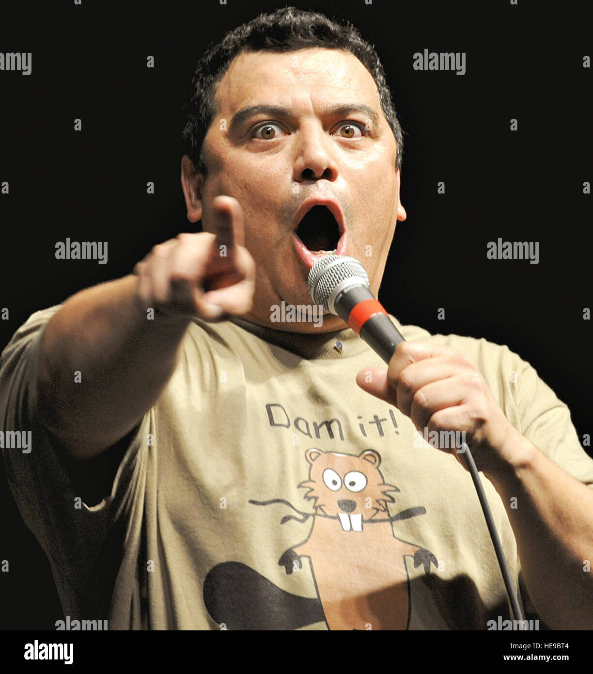 ANCHORAGE, Alaska -- Comedian Carlos Mencia, points at crowd members ...