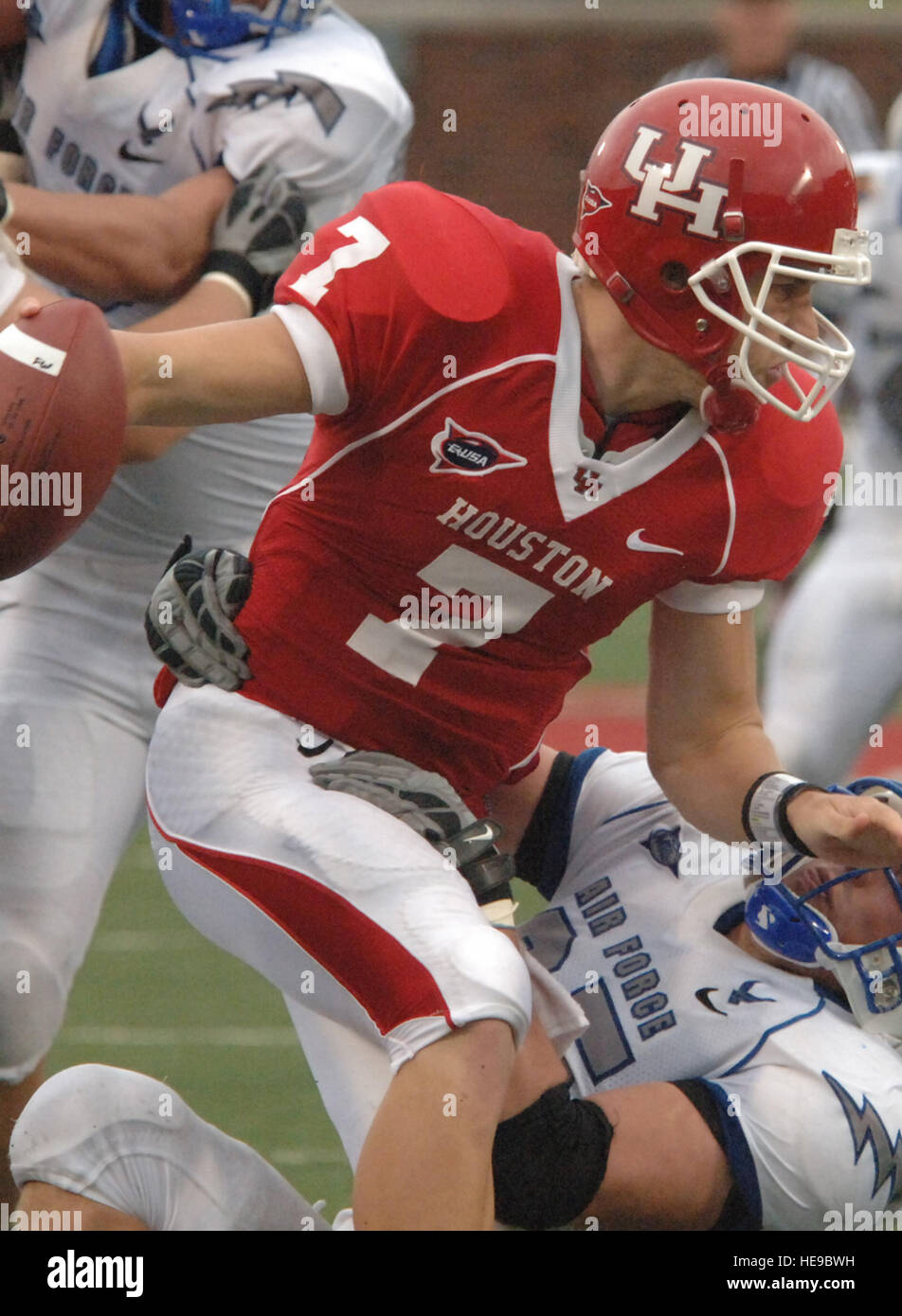 U.S. Air Force Academy defensive end makes a sack during a football ...