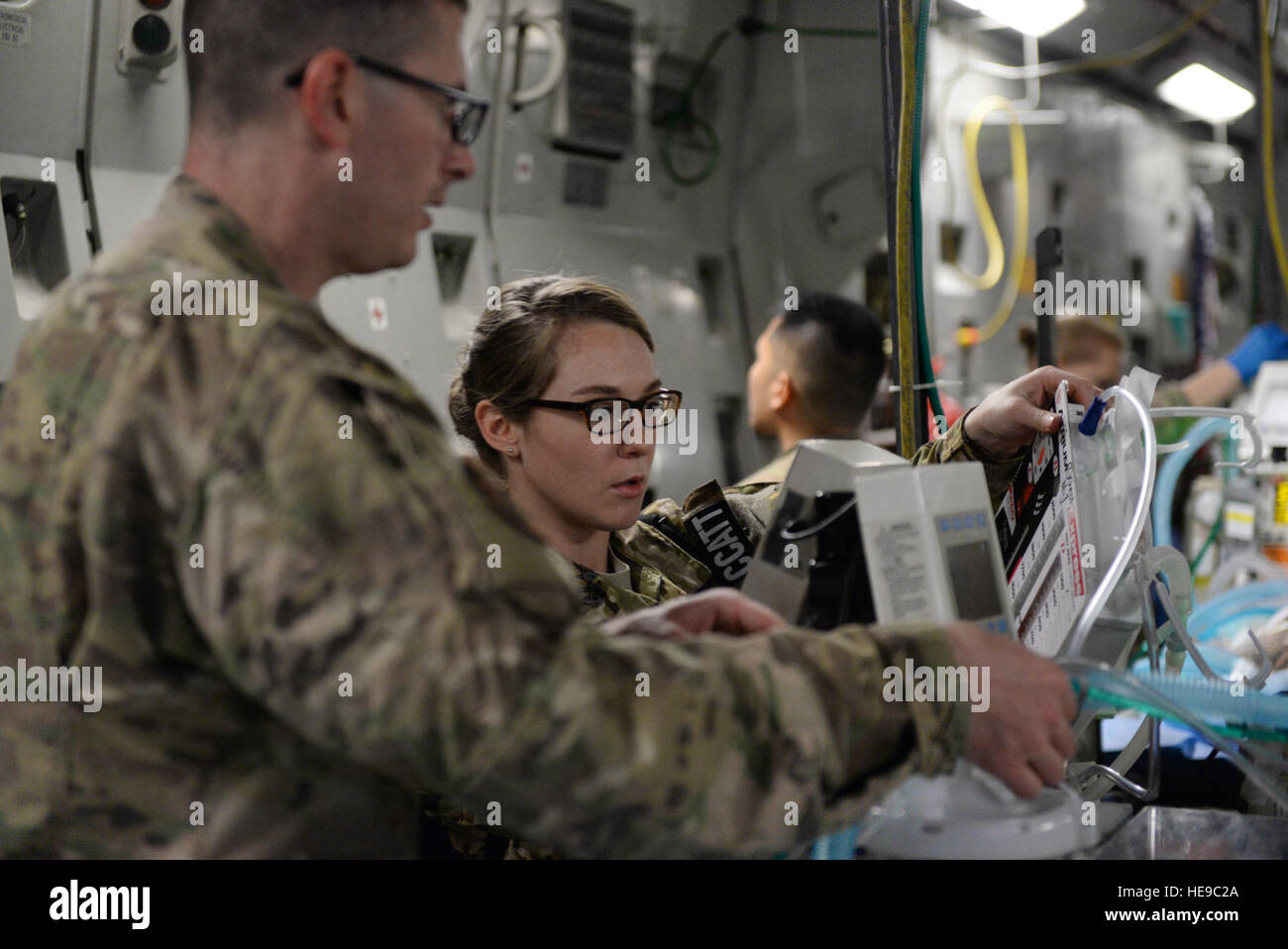 U.S. Air Force Critical Care Air Transport Team members check on a ...