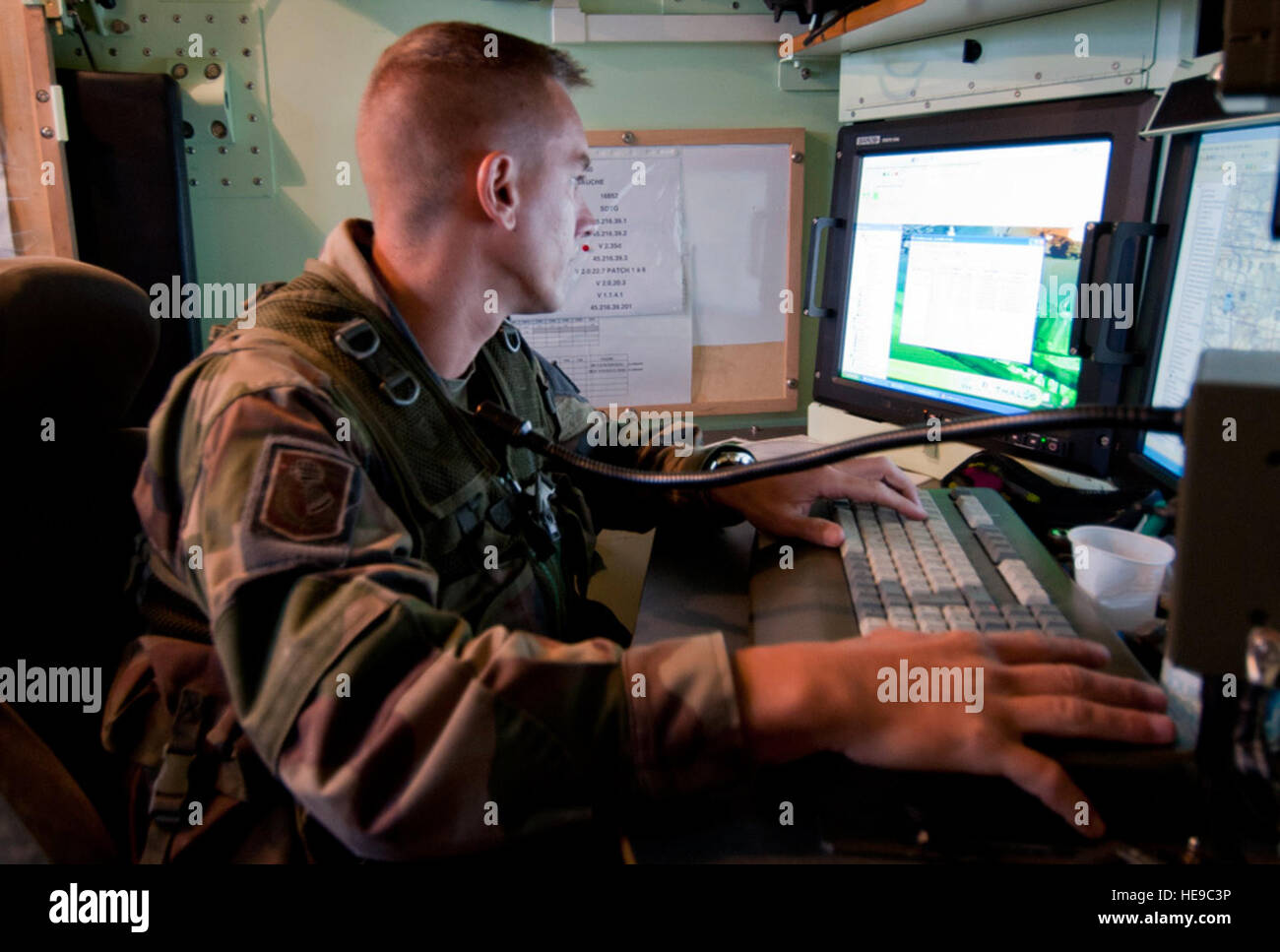 French fire direction Sgt. Bruno Bernier coordinates fire support with ...