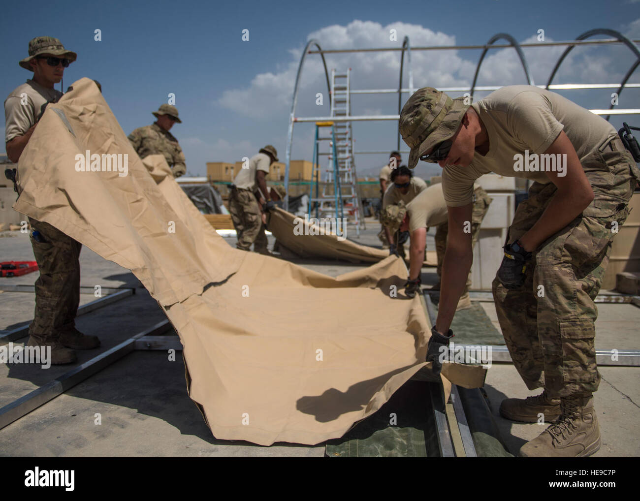 Staff Sgt. James Solis (right), 455th Expeditionary Civil Engineer ...