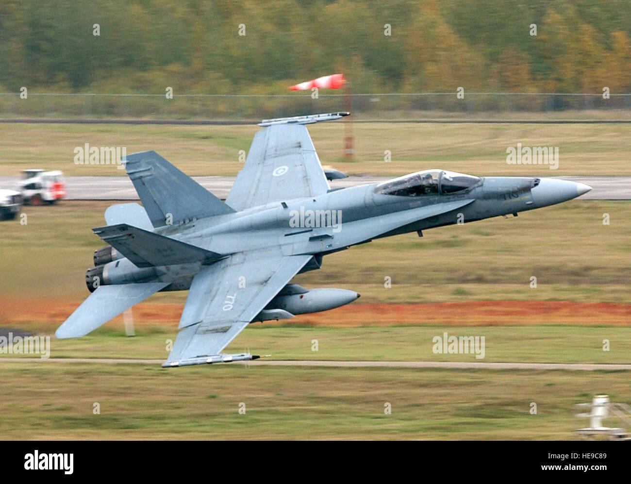 A Royal Canadian Air Force (RCAF) CF-18 Hornet, 4-Wing, takes off from ...