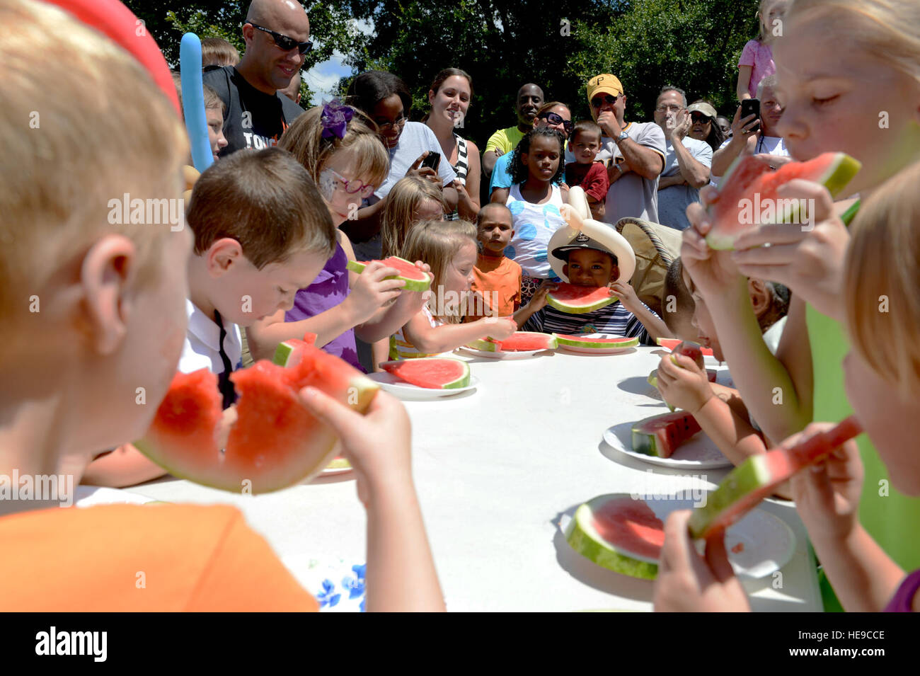 Children compete in a watermelon eating contest during the Shawsome ...