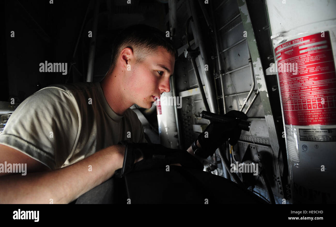 U.S. Air Force Senior Airman Beau Lewis, a crew chief with the 146th ...