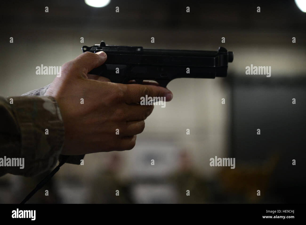 An U.S. Air Force Airman participates in weapon drills during Check Six ...