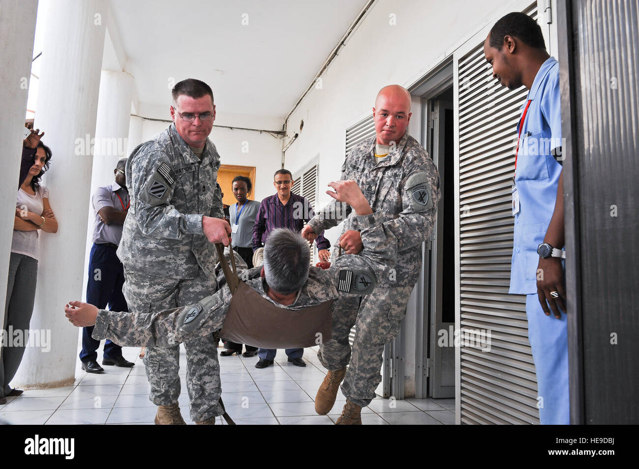 U.S. Army Sgt. 1st Class Ryan Watson, left, and Army Staff Sgt. James ...
