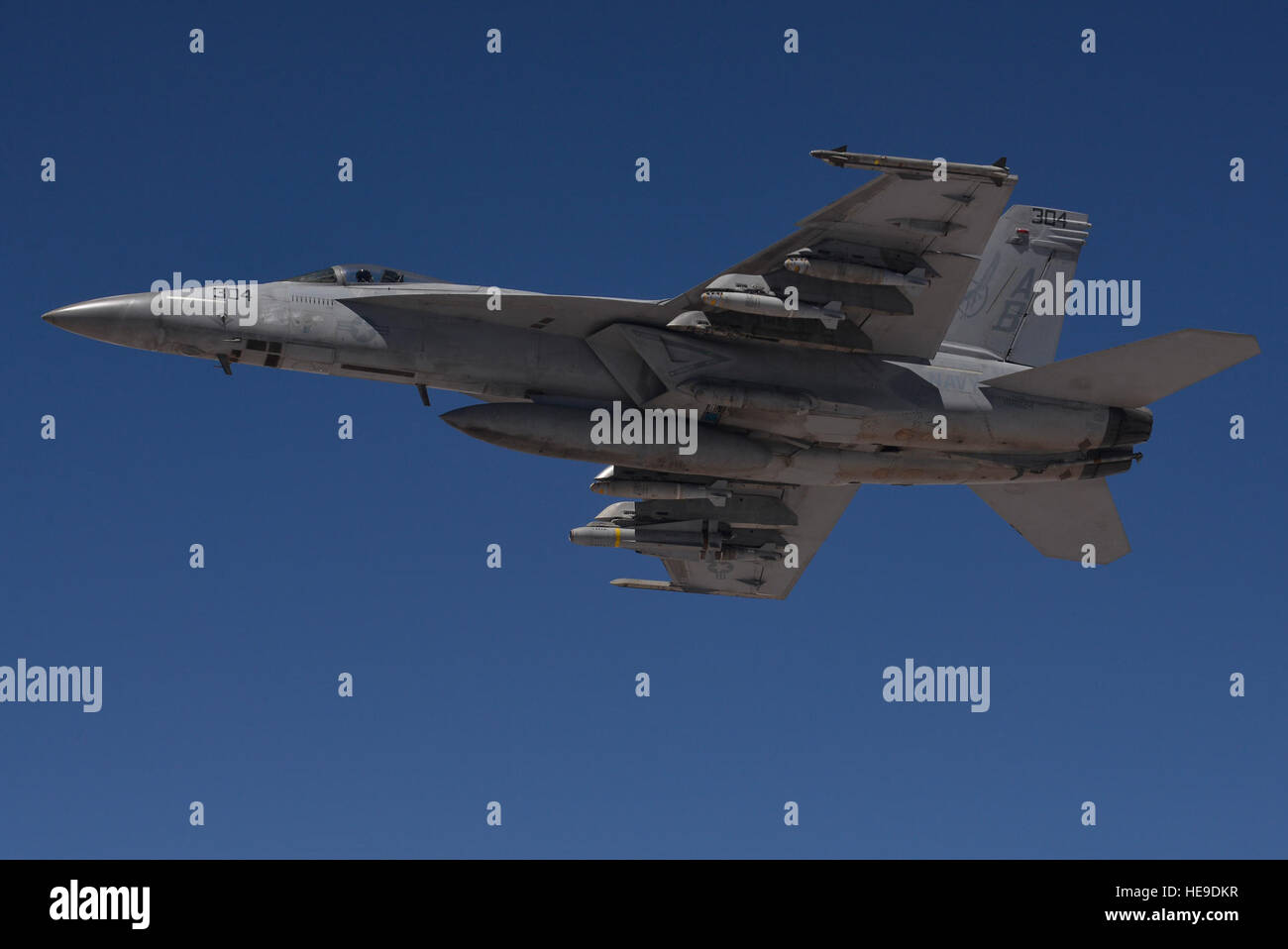 A U.S. Navy F/A-18F Super Hornet flies a combat sortie over Iraq July 2 ...
