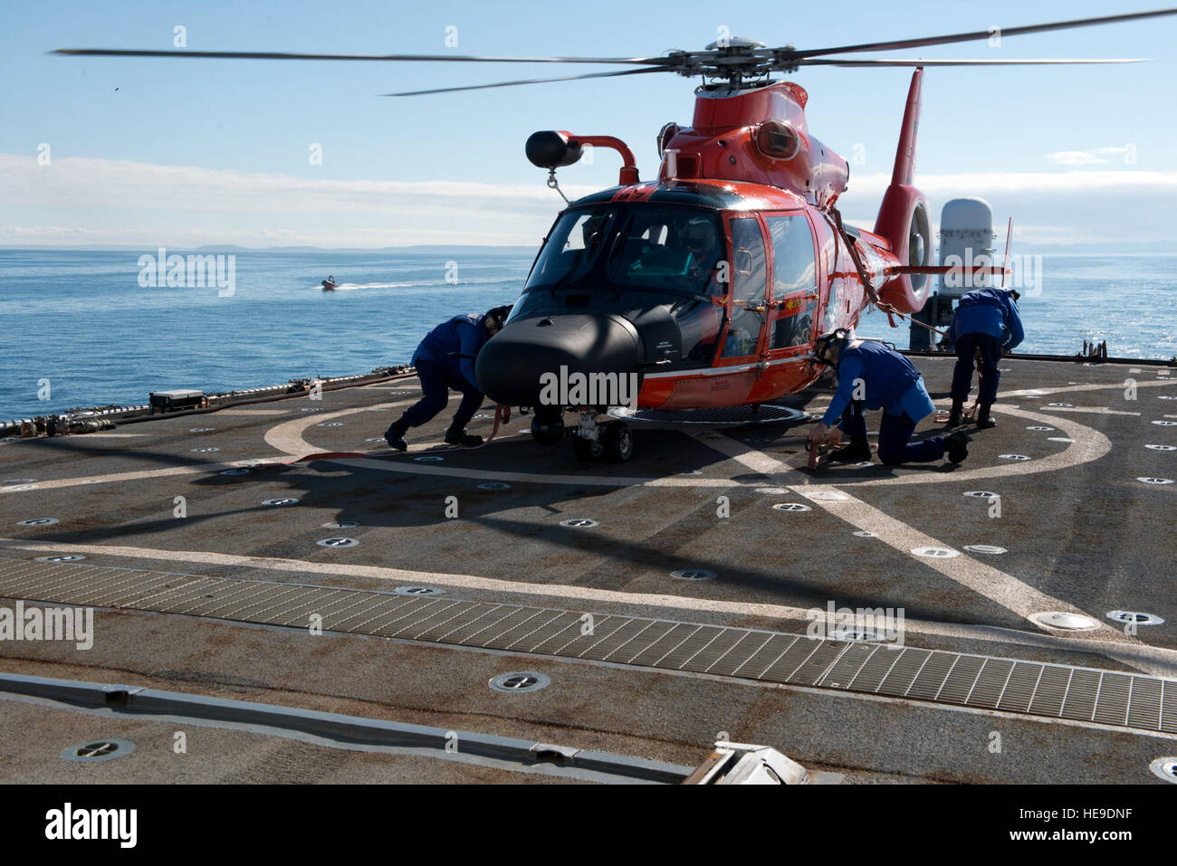 Crewmembers aboard the Coast Guard Cutter Midgett, a 378-foot high ...
