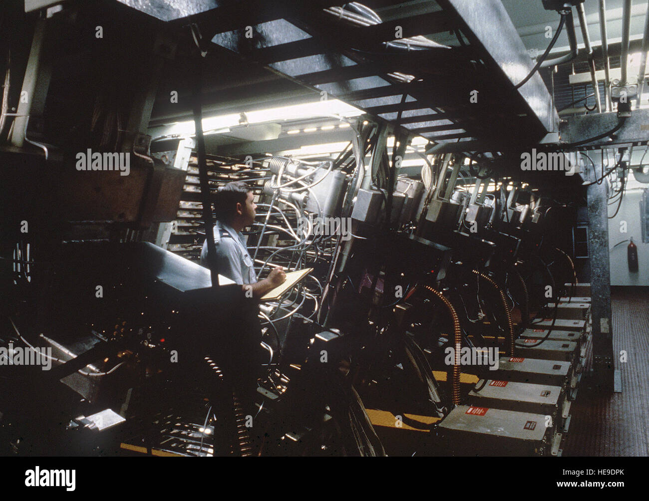 A US Air Force quality assurance evaluator inpsects electrical ...