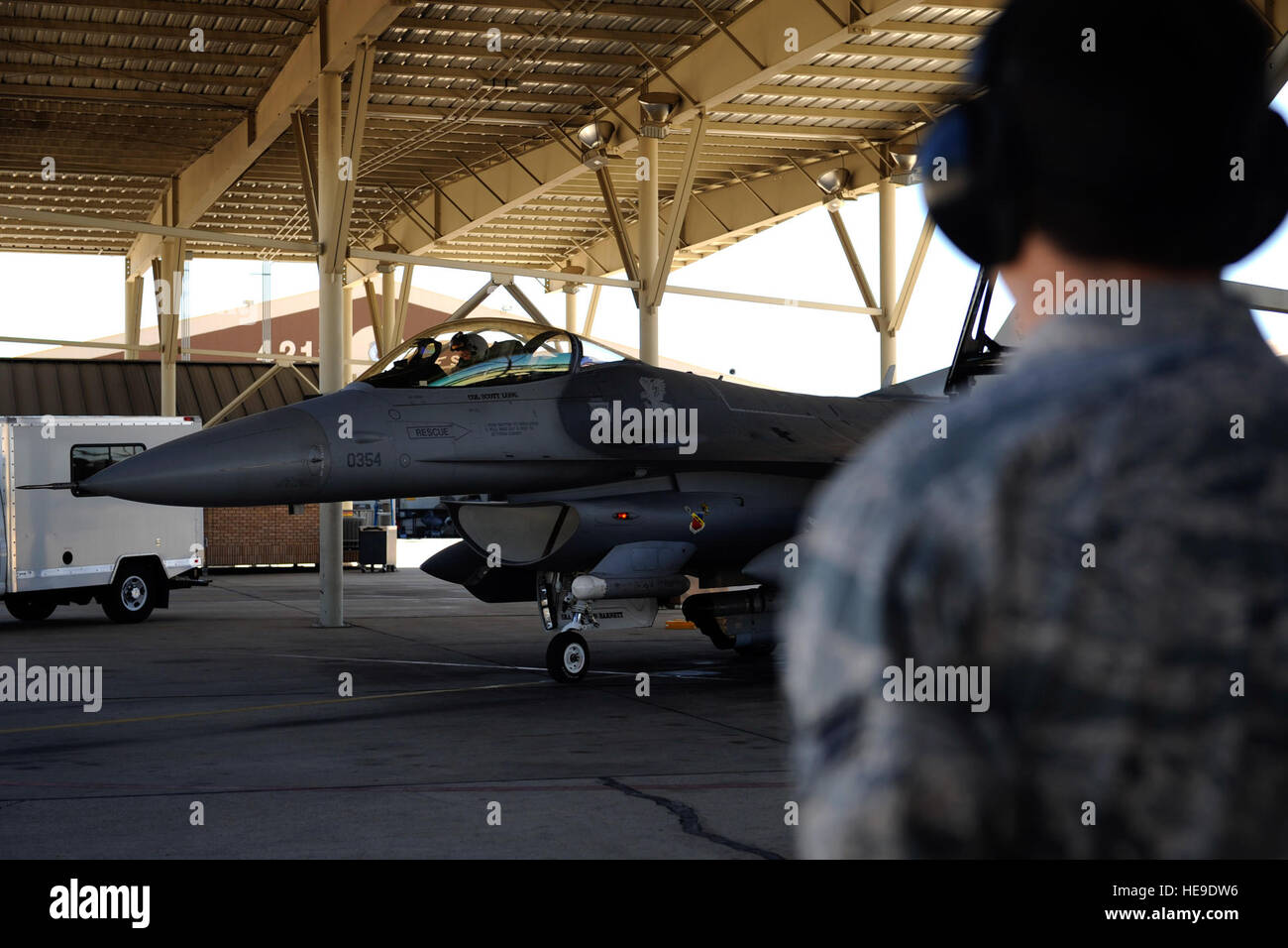 U.S. Air Force Col. Scott Long, checks his plane's systems before ...