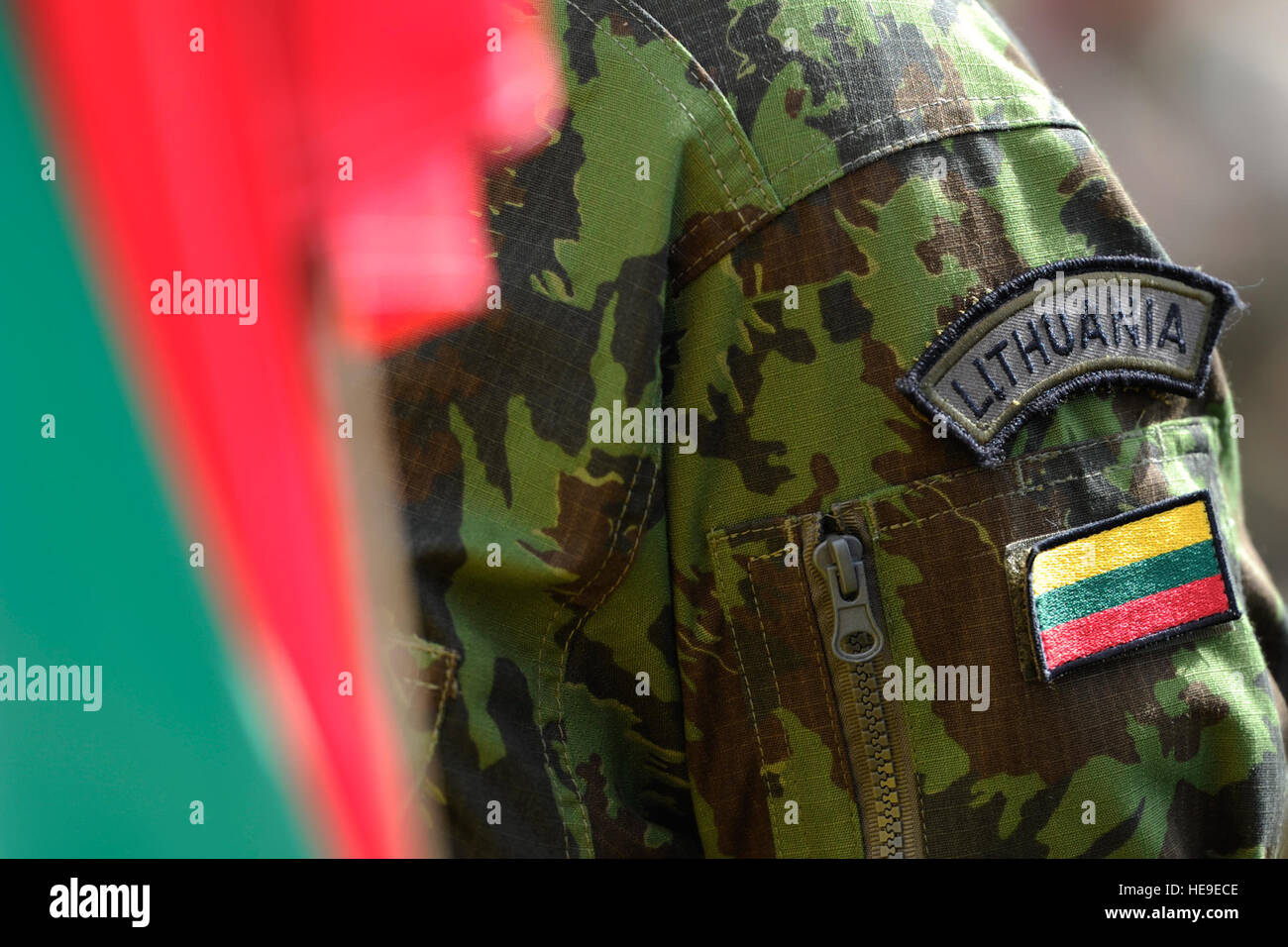 Lithuanian military members stand in formation during the opening ...